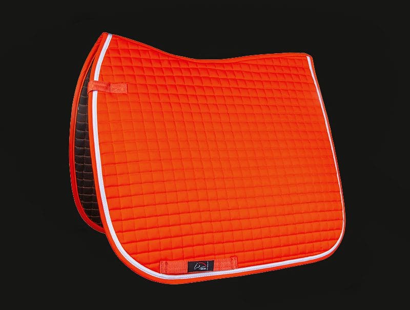 Over 20 stunning designs of orange saddle pads | Pink Equine